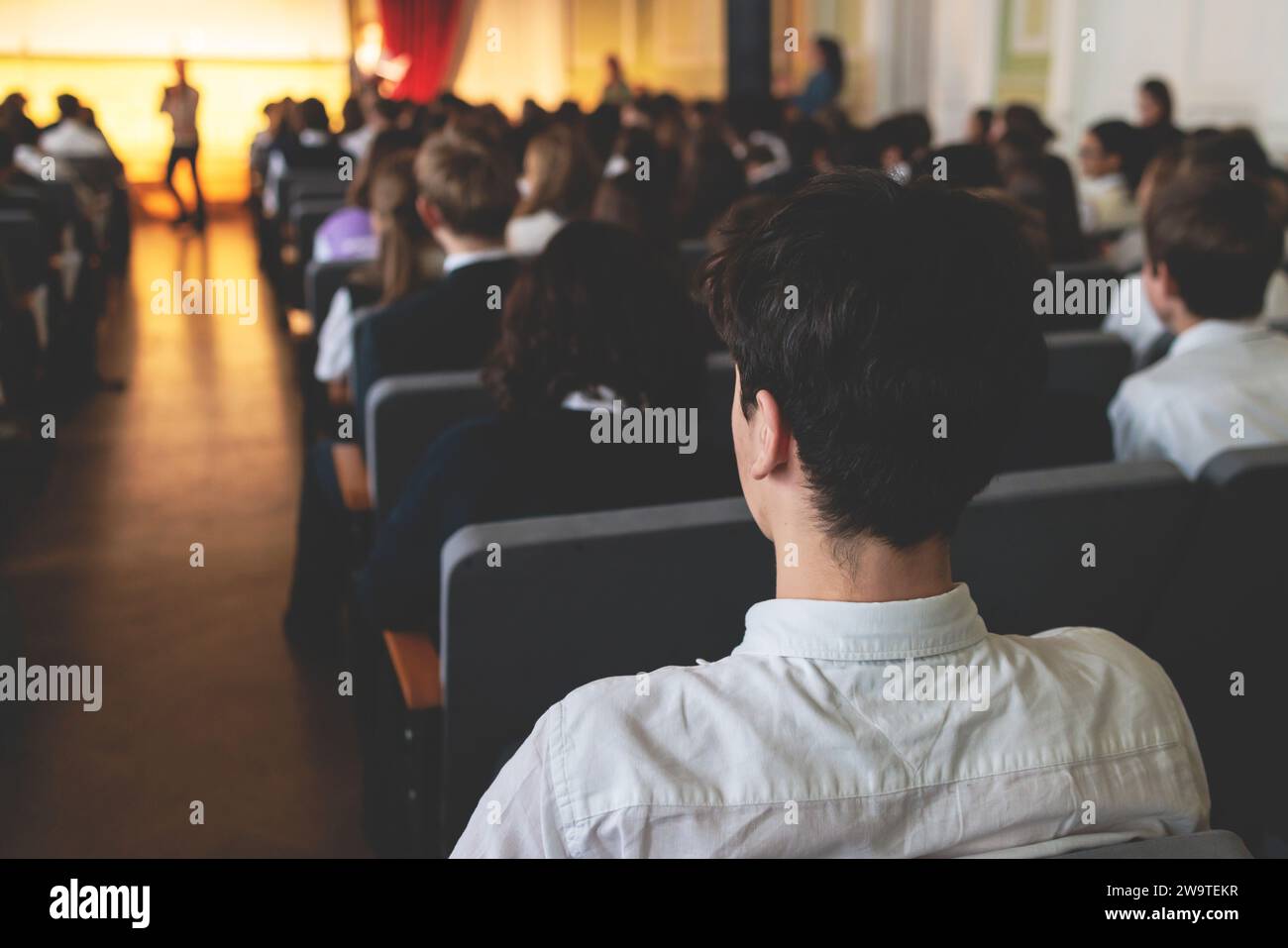 Boy in school hall auditorium hi-res stock photography and images - Alamy