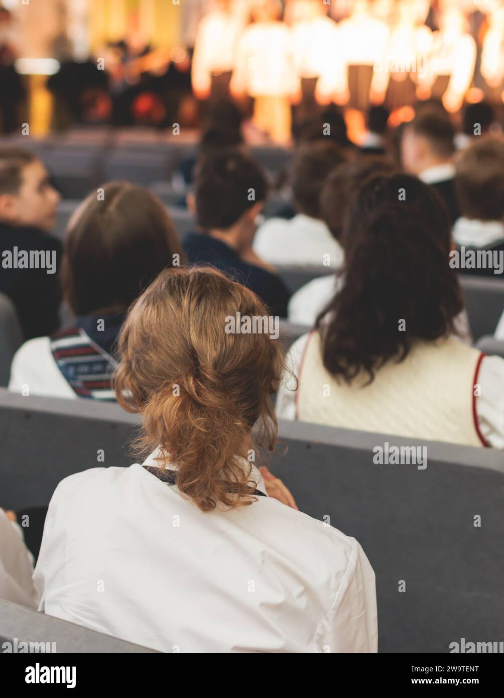 Boy in school hall auditorium hi-res stock photography and images - Alamy