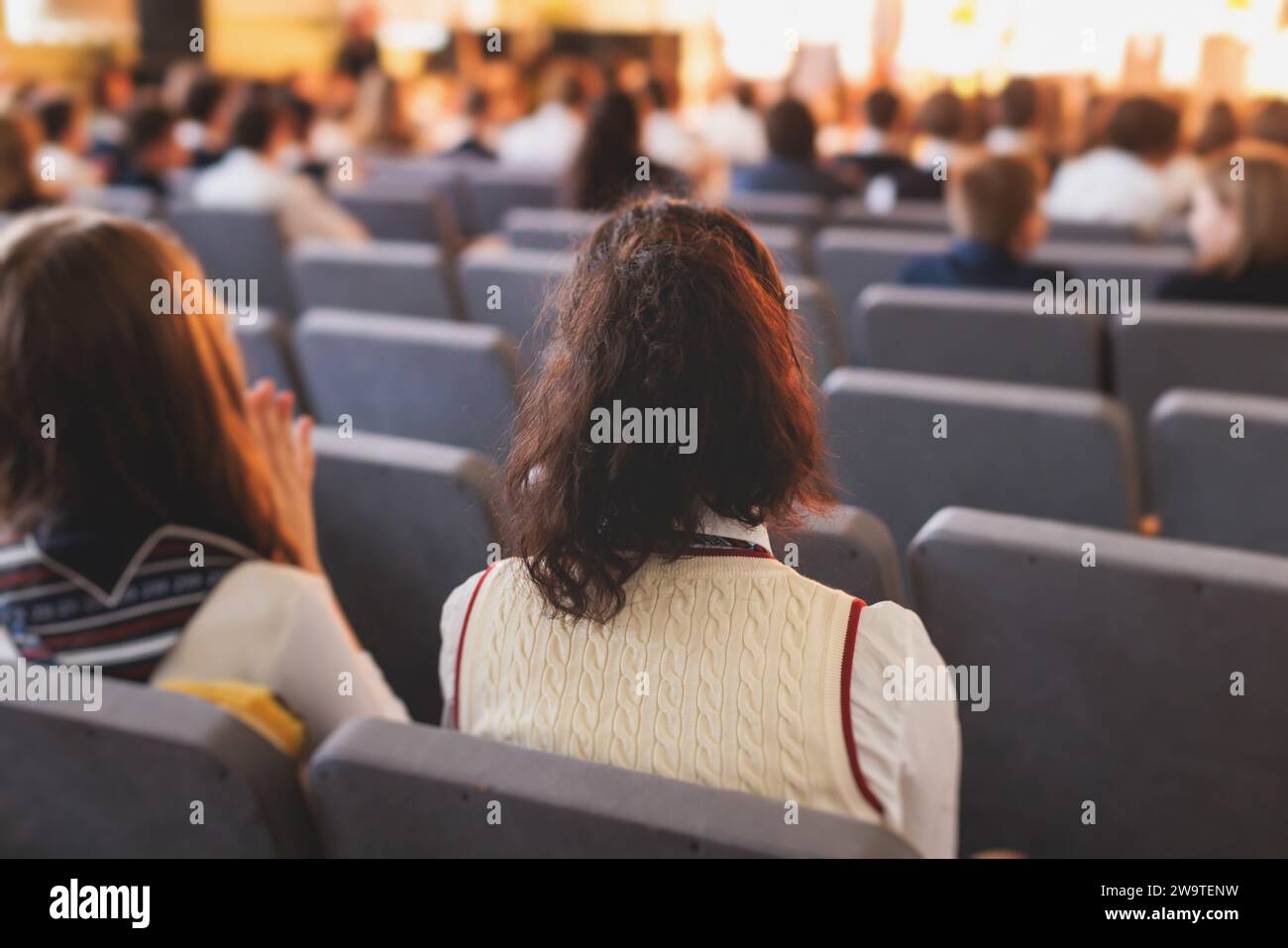 School audience students in a hall watch school musical theatre ...