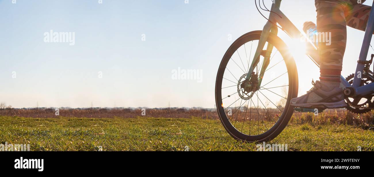 Girl riding bicycle low angle hi-res stock photography and images - Alamy