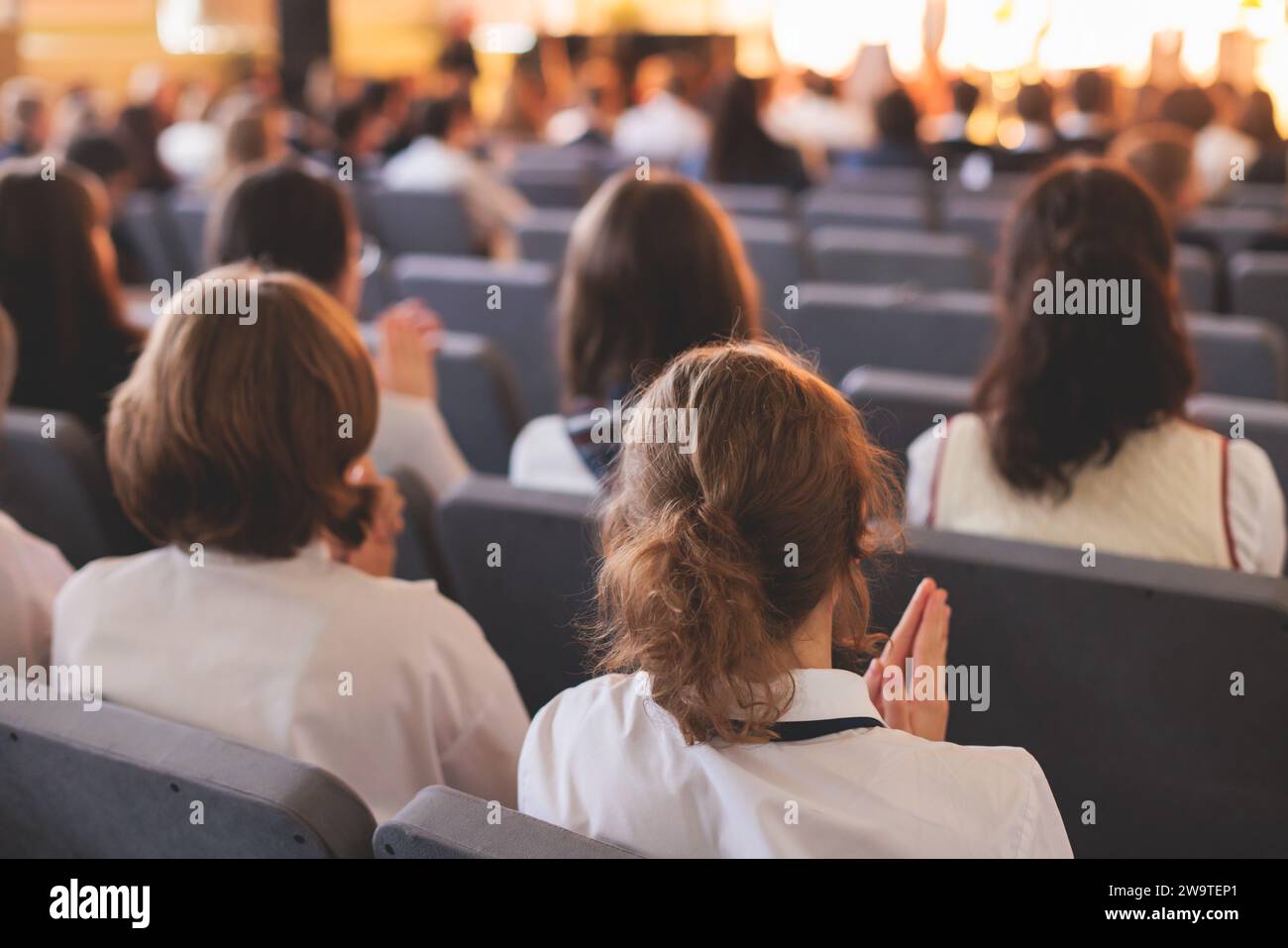 Boy in school hall auditorium hi-res stock photography and images - Alamy