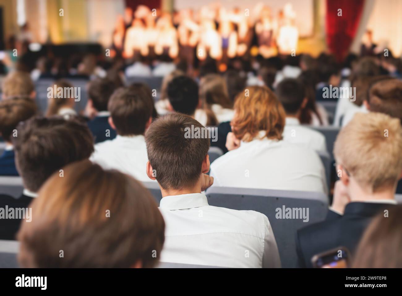 Boy in school hall auditorium hi-res stock photography and images - Alamy