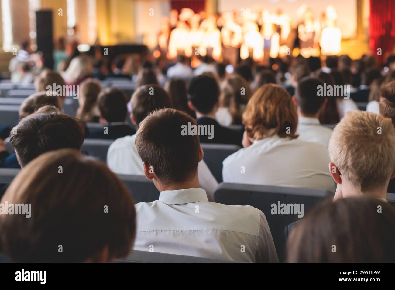 Boy in school hall auditorium hi-res stock photography and images - Alamy