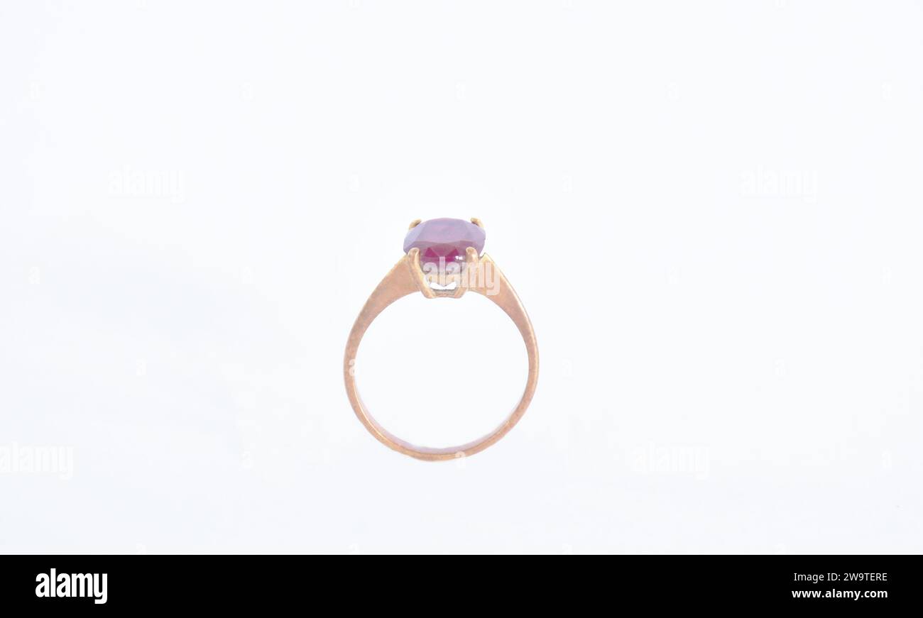 purple gem ring arranging on white background Stock Photo - Alamy