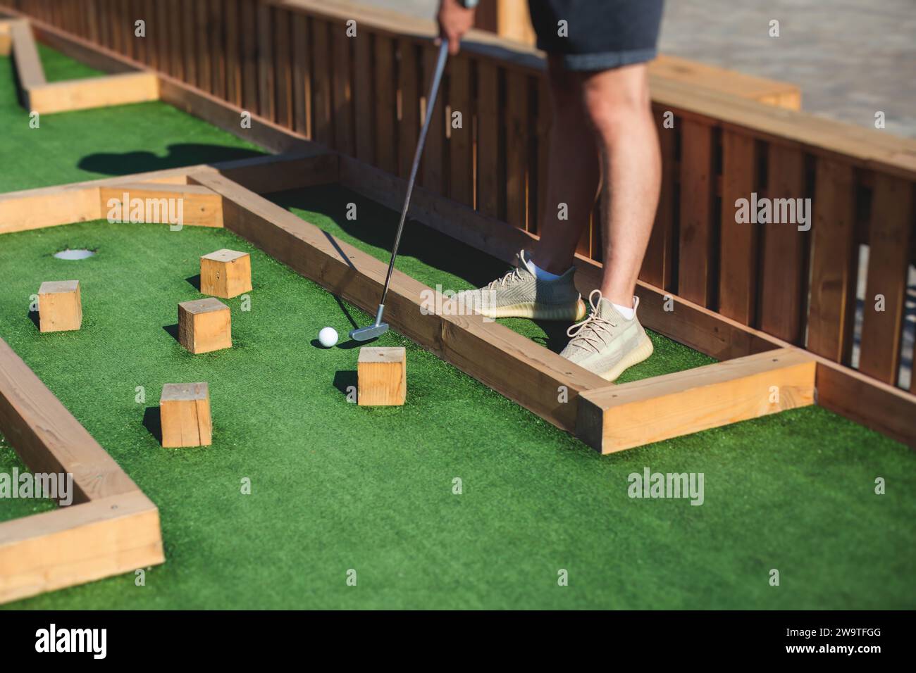 Mini golf course, process of playing miniature golf on a green ...