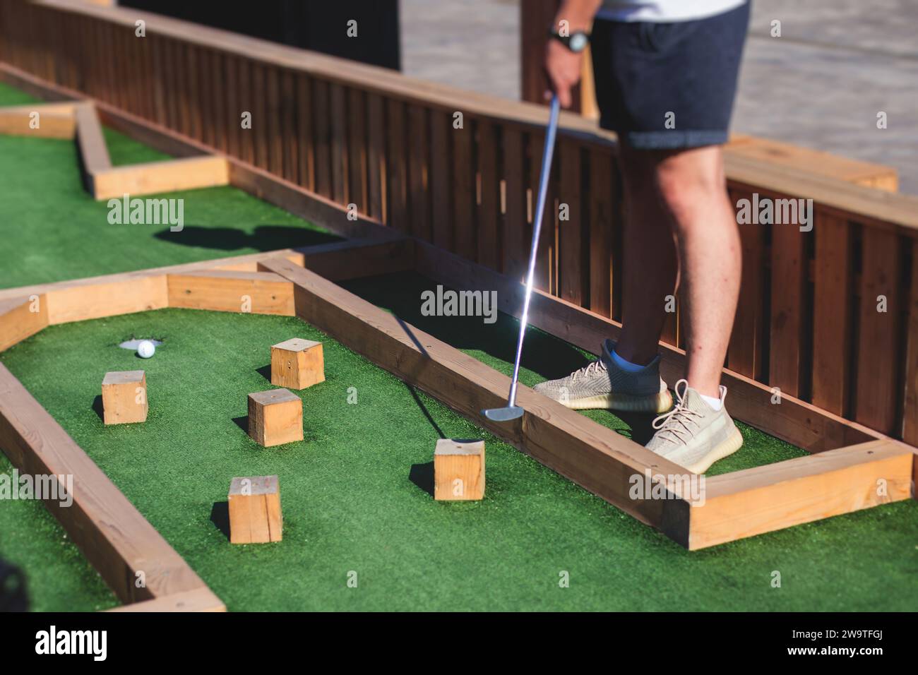 Mini golf course, process of playing miniature golf on a green ...