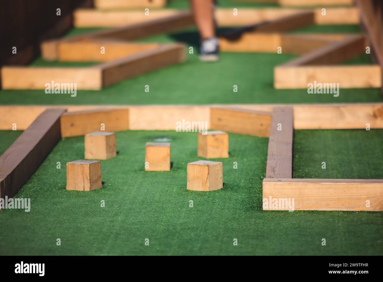 Mini golf course, process of playing miniature golf on a green ...