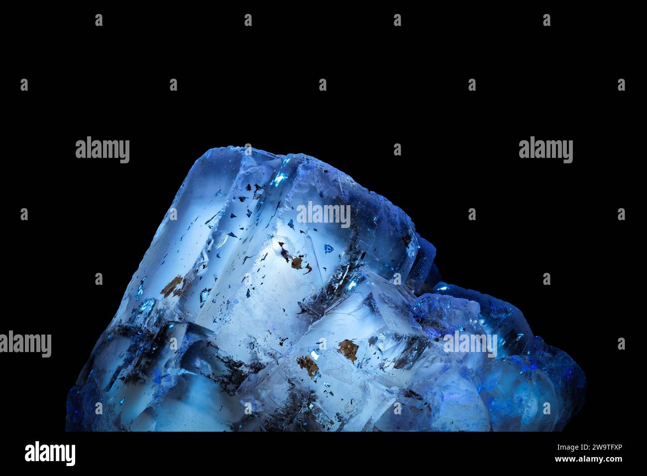 fluorite phantom under long wave UV light on black background. macro ...
