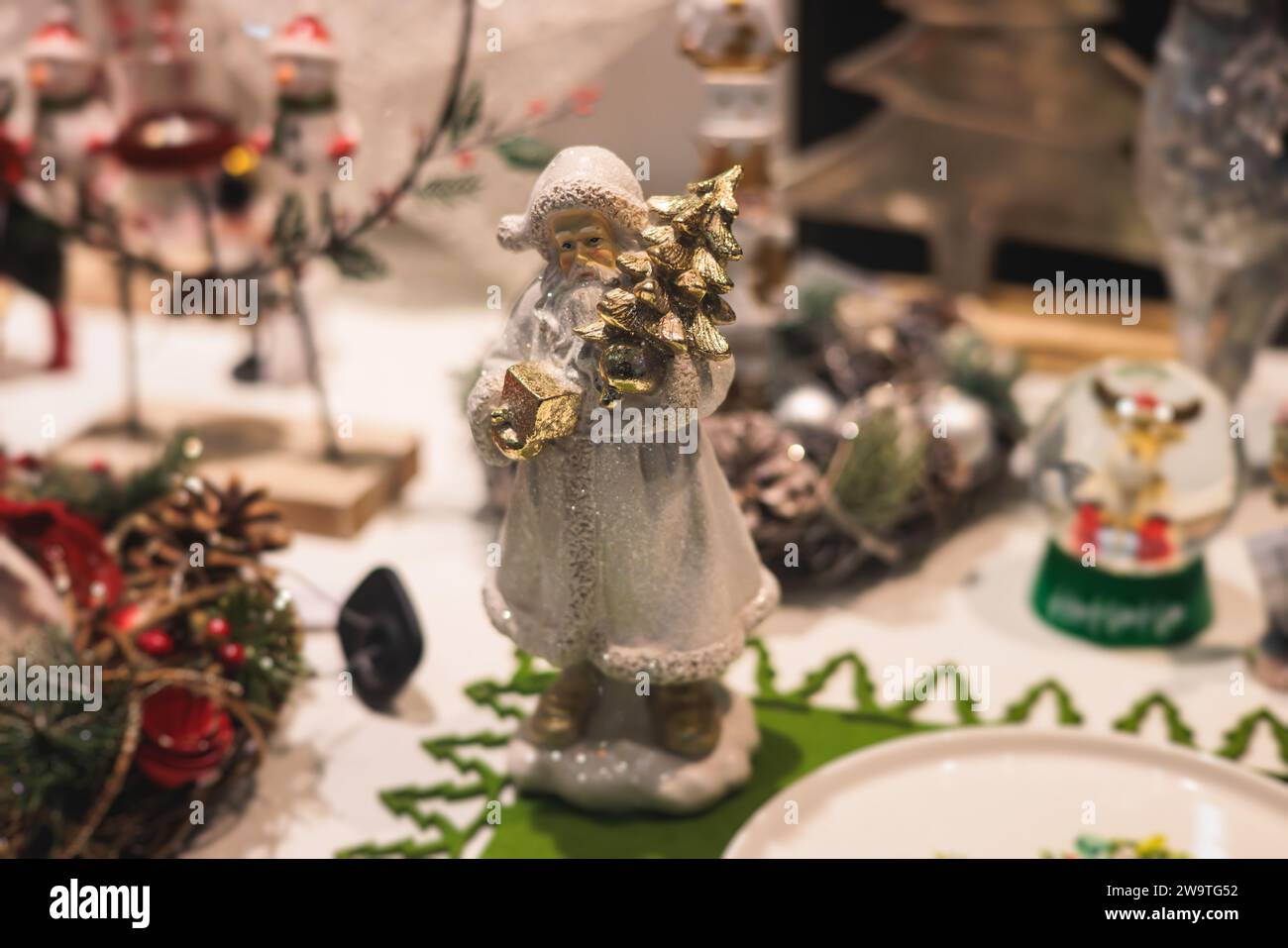 Crowded Christmas market fair with New Year decorations, balloons ...