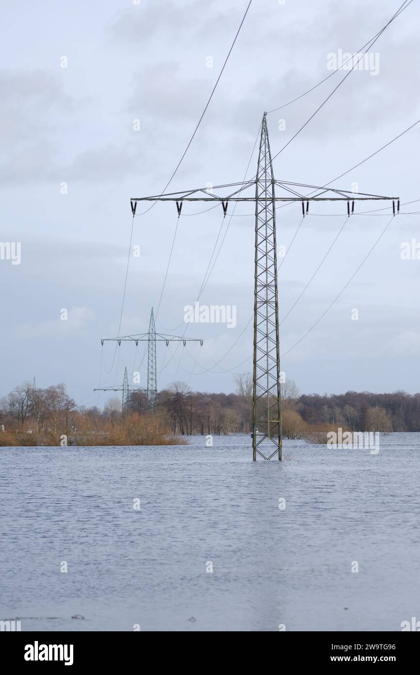 Lilienthal, Germany. 30th Dec, 2023. A high-voltage power line is in ...