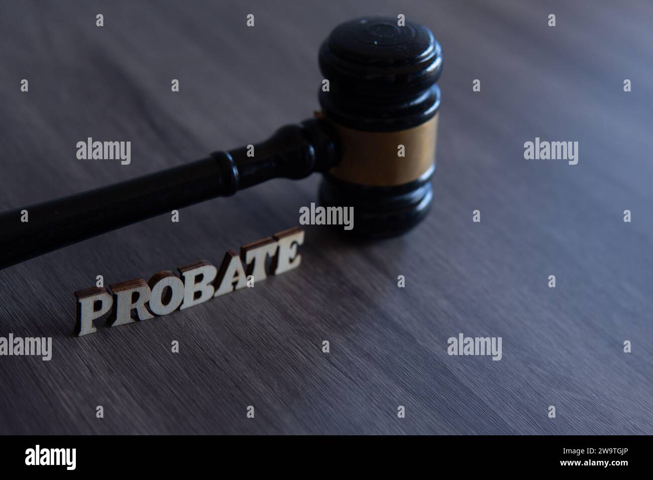 Closeup image of judge gavel and word PROBATE. Copy space for text ...