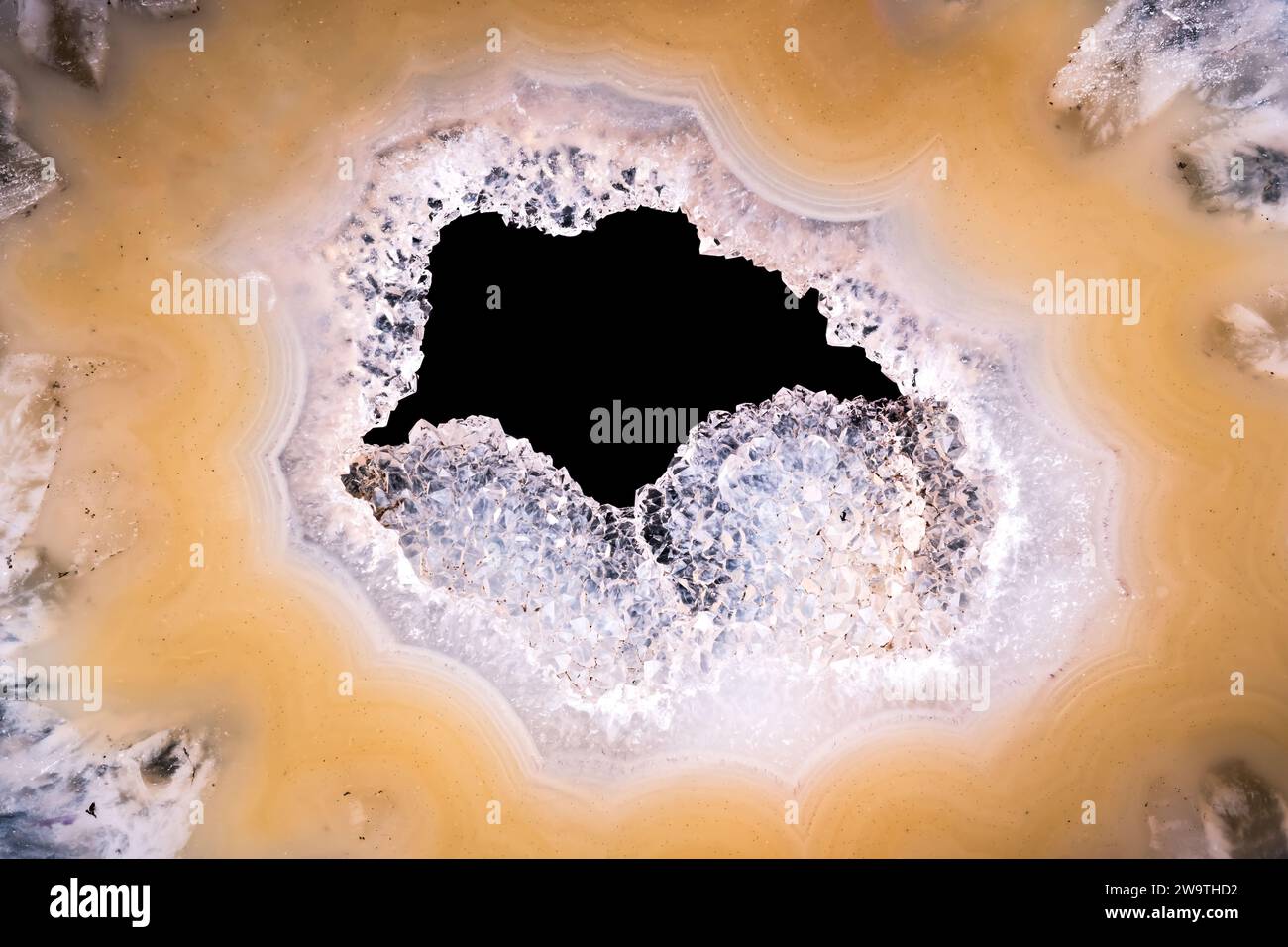 quartz druse at the center of an agate macro detail texture background ...