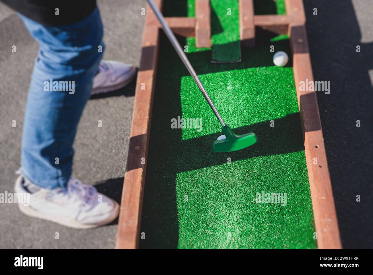 Mini golf course, process of playing miniature golf on a green ...
