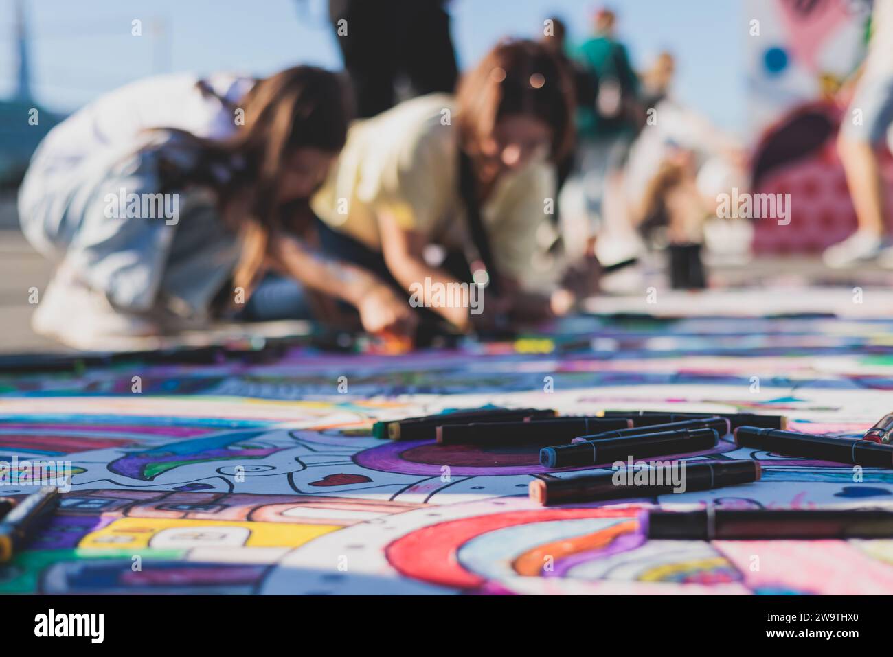 Process of drawing on asphalt and pavement, kids and children with ...