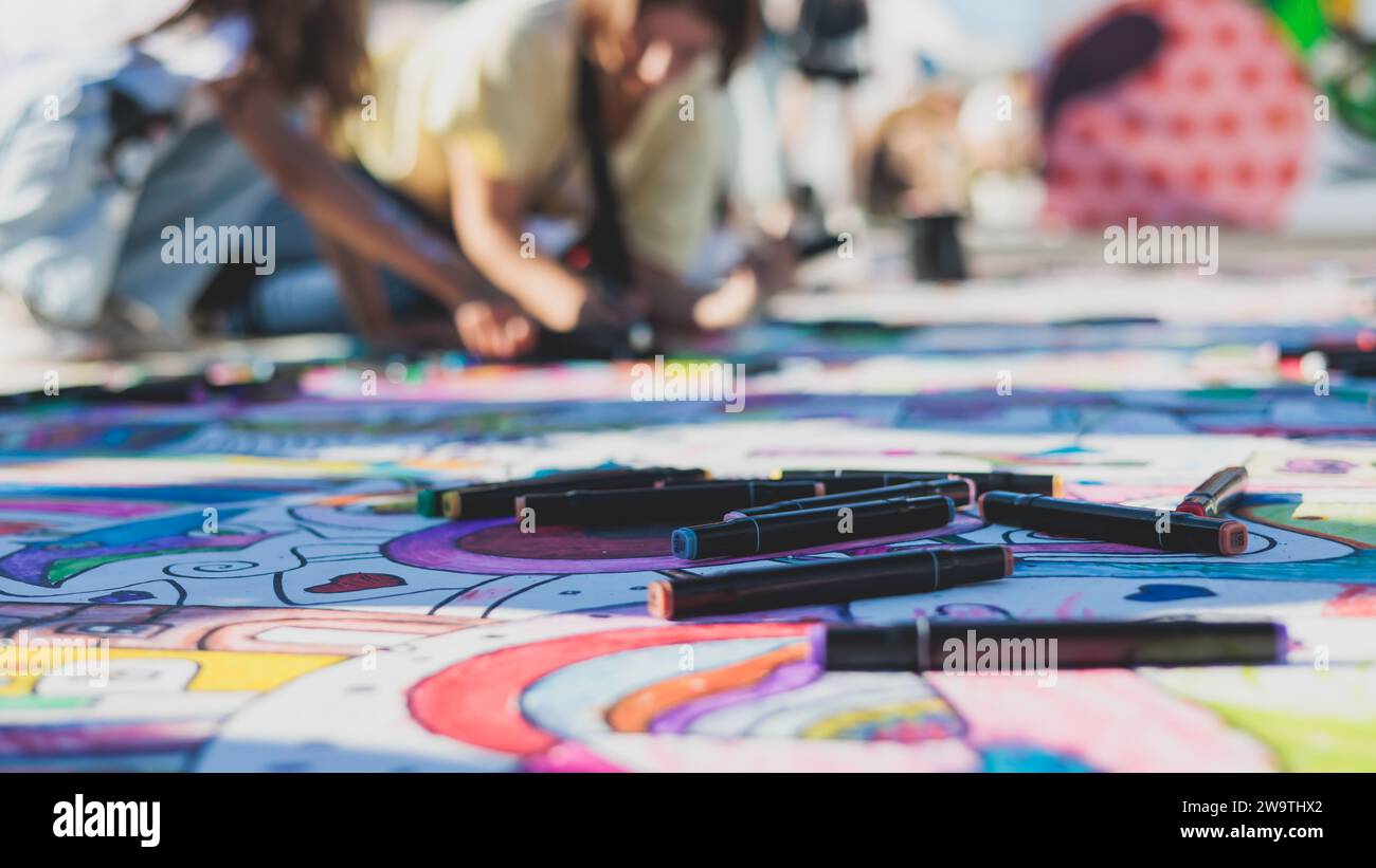 Process of drawing on asphalt and pavement, kids and children with ...