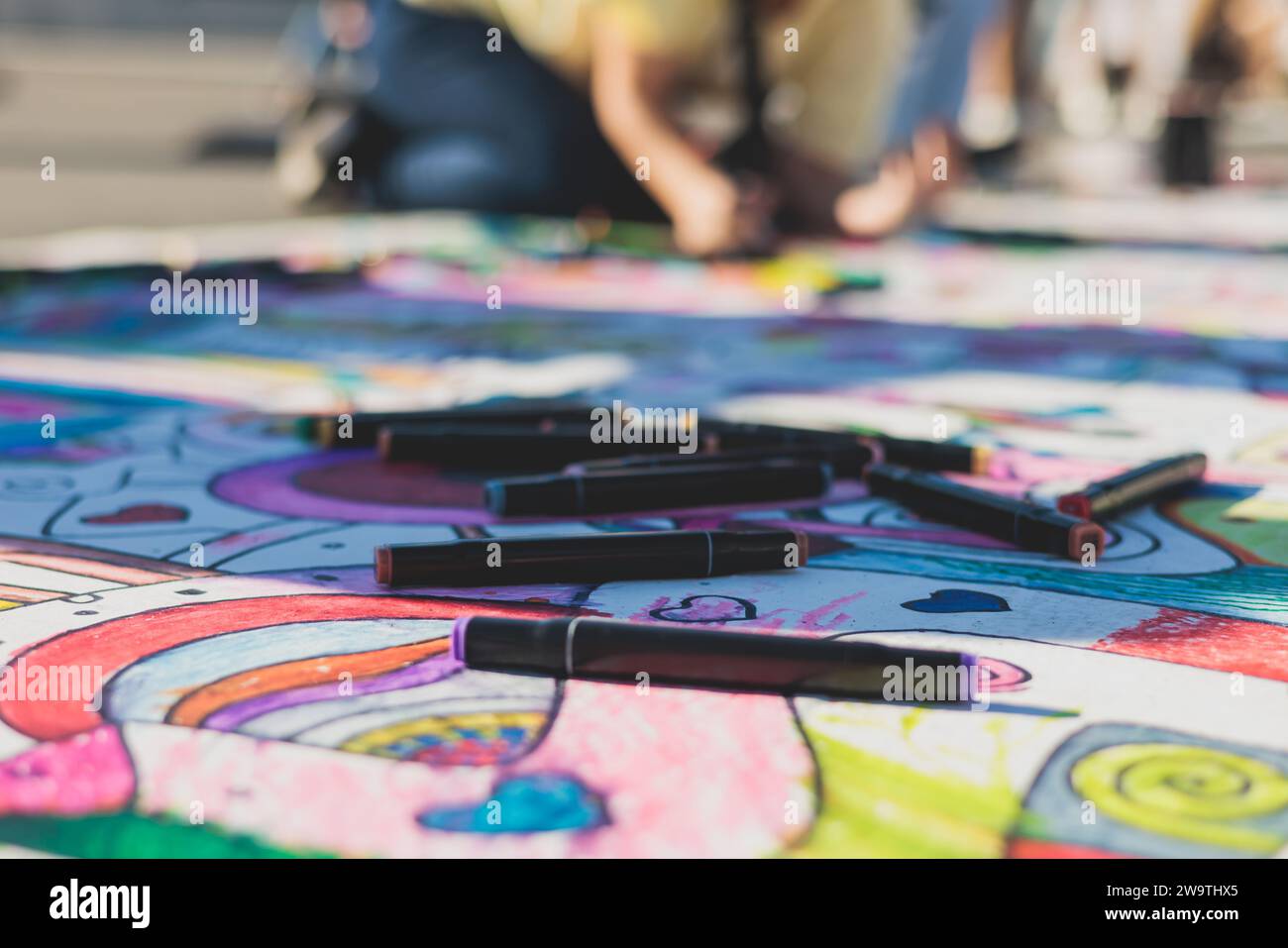 Process of drawing on asphalt and pavement, kids and children with ...