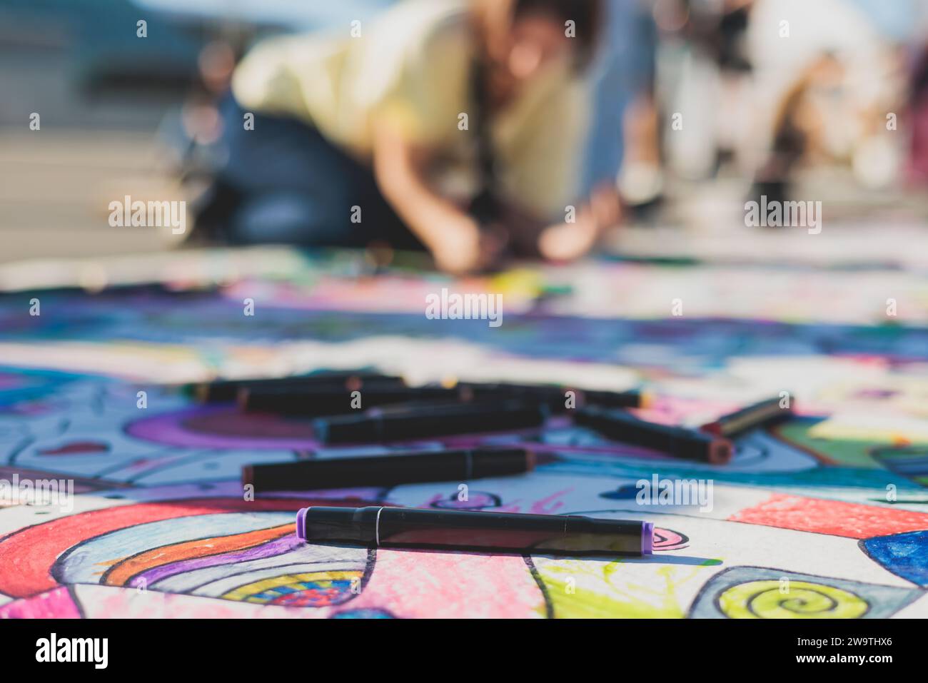 Process of drawing on asphalt and pavement, kids and children with ...