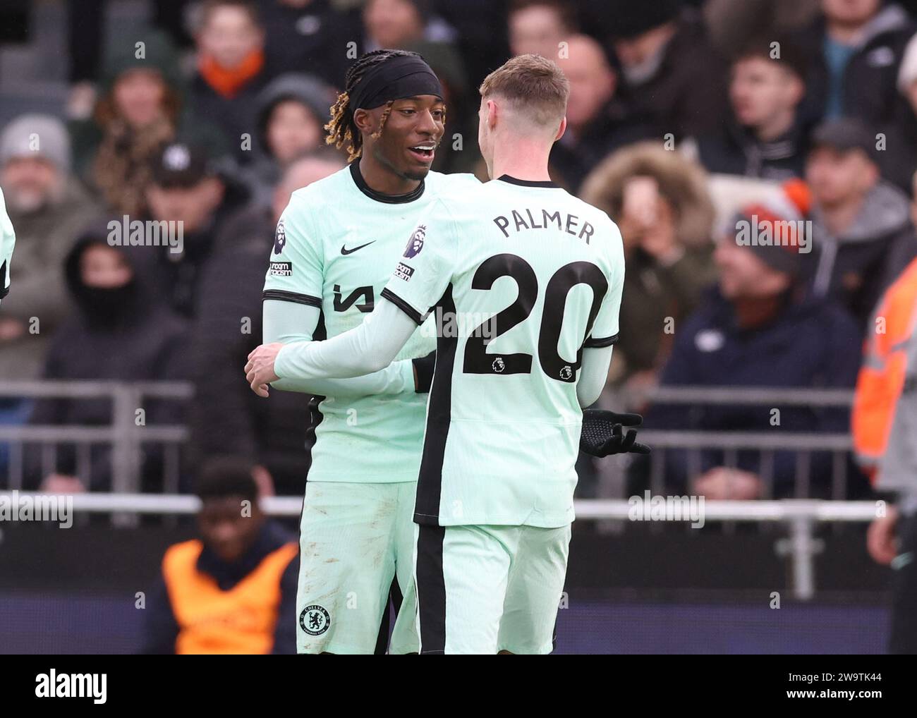 Luton, UK. 30th Dec, 2023. Noni Madueke of Chelsea turns to celebrate ...