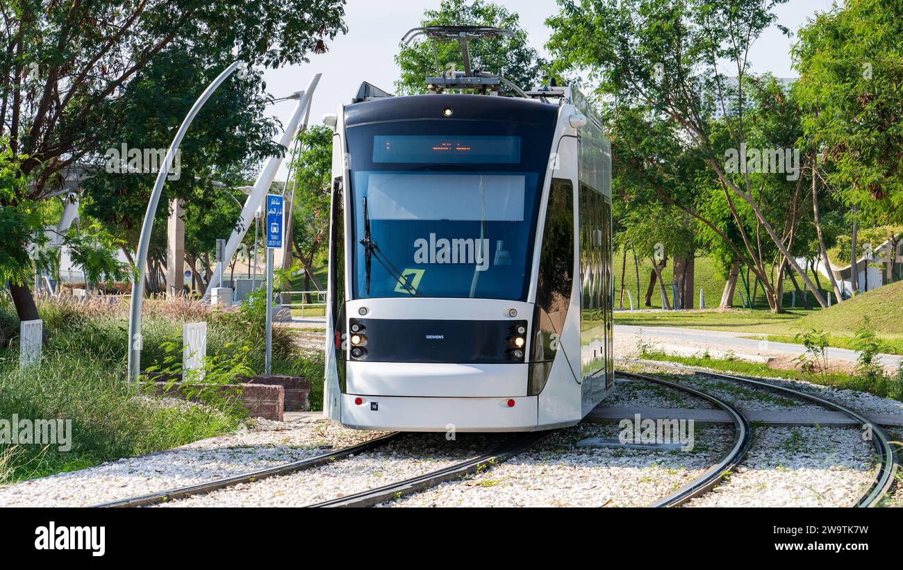 Doha, Qatar- December 12,2023 : yellow line Tram at education city ...