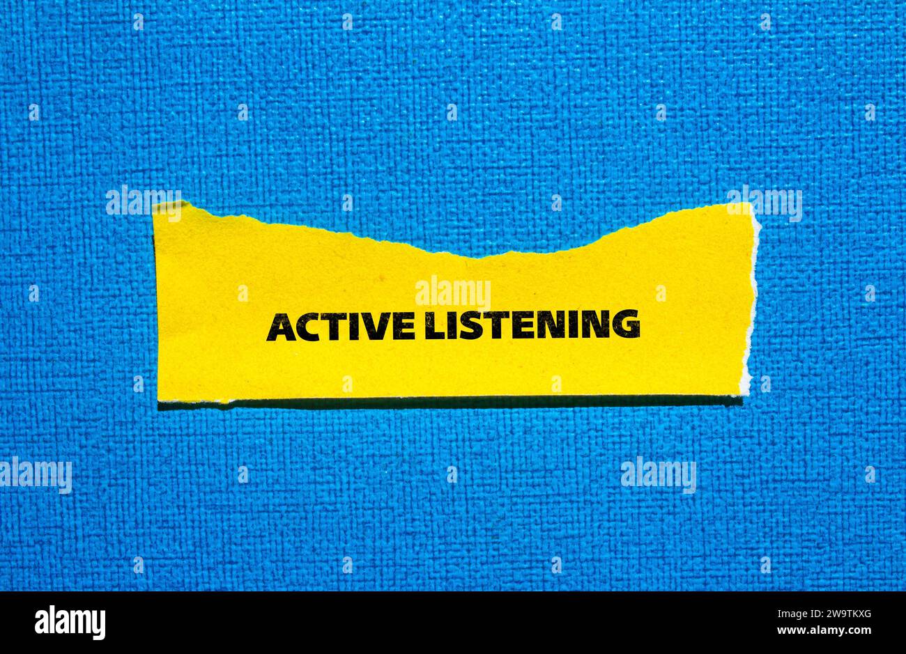Active listening lettering on ripped paper. Top view, copy space Stock ...