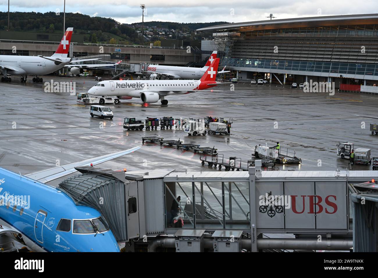 Blue plane of KLM company with connector or pull out arm for embarking ...