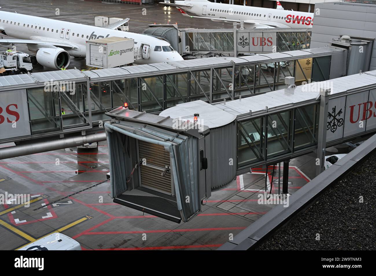 Several connectors or pull out arms for embarking of passenger are ...