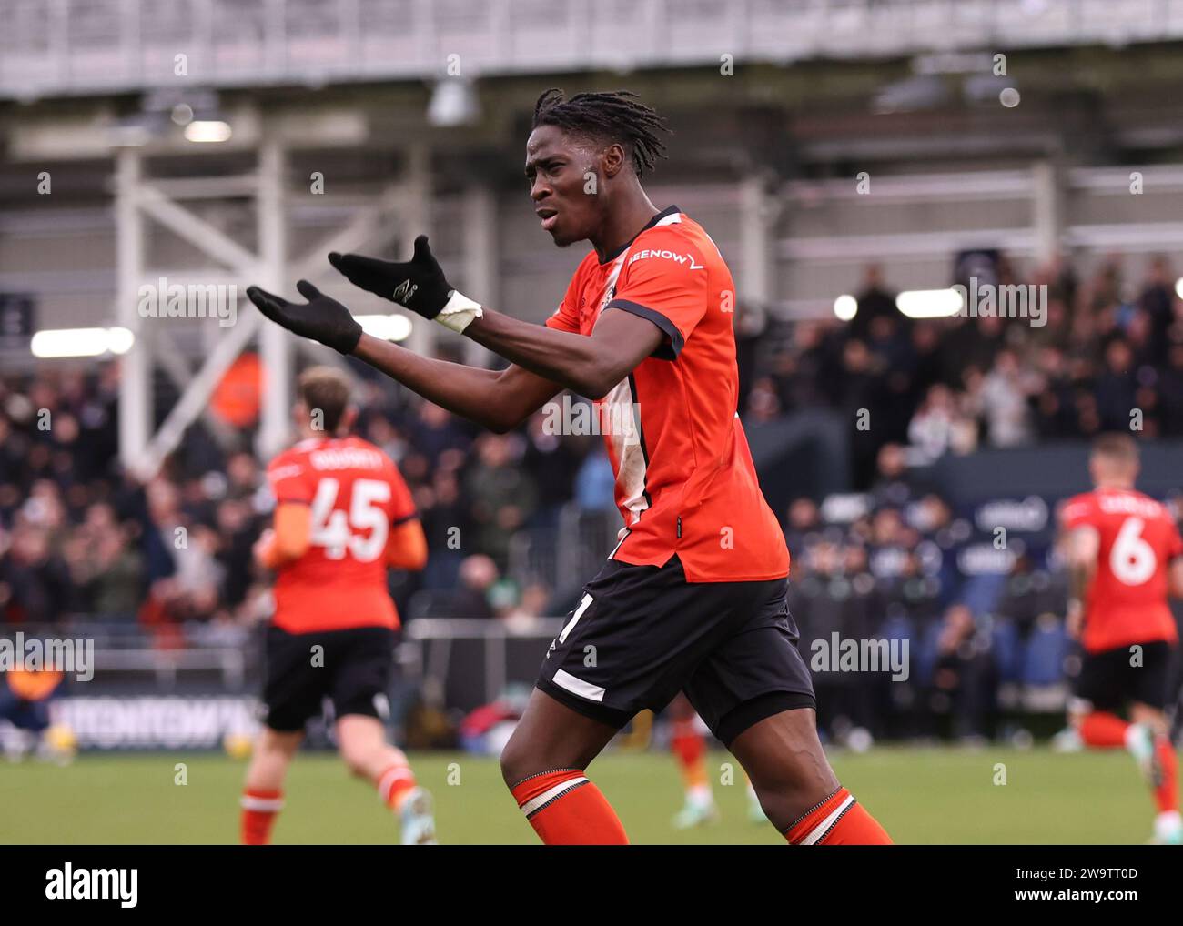 Luton, UK. 30th Dec, 2023. Elijah Adebayo of Luton Town celebrates ...