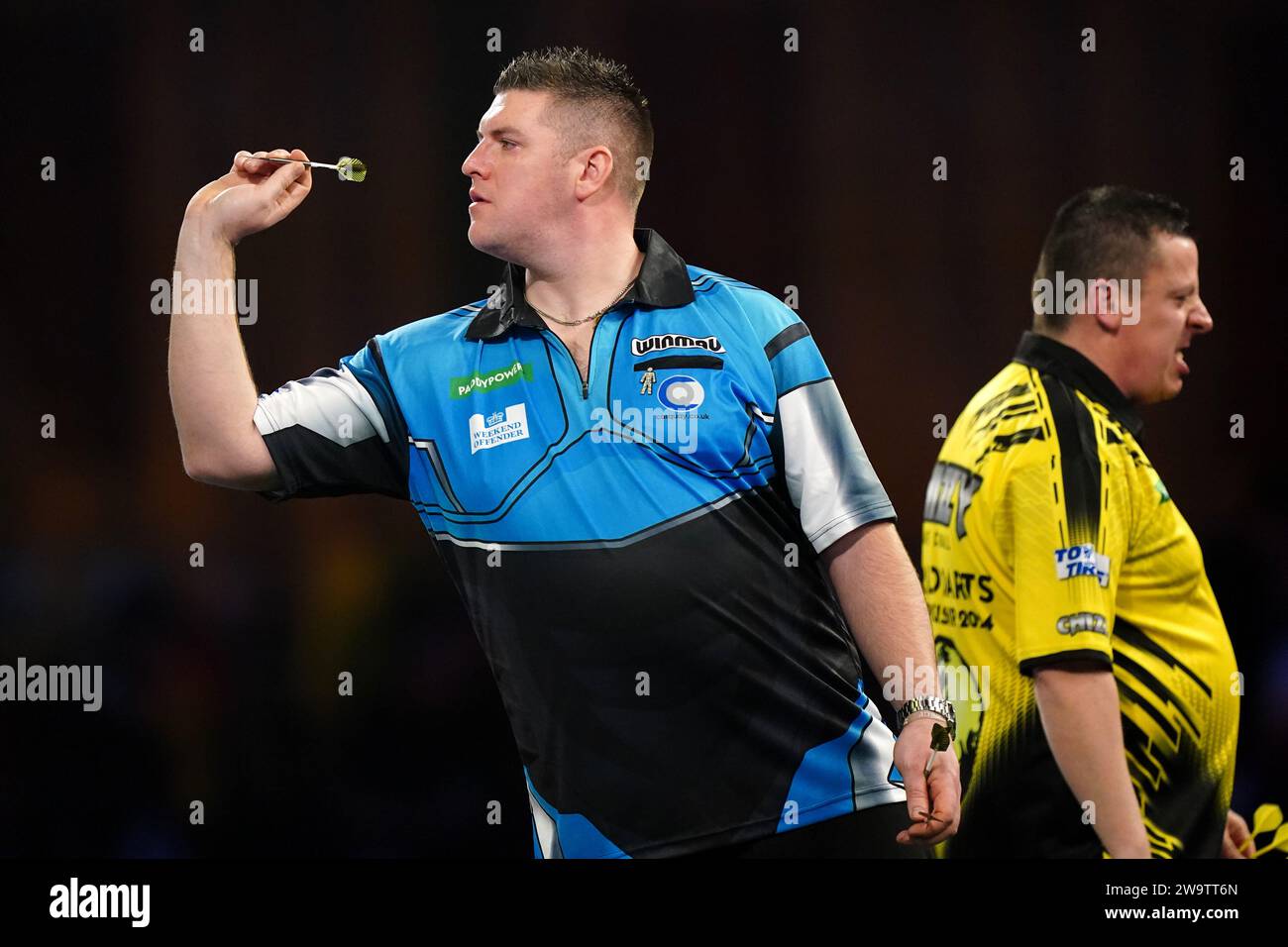 Daryl Gurney in action against Dave Chisnall (not pictured) on day ...