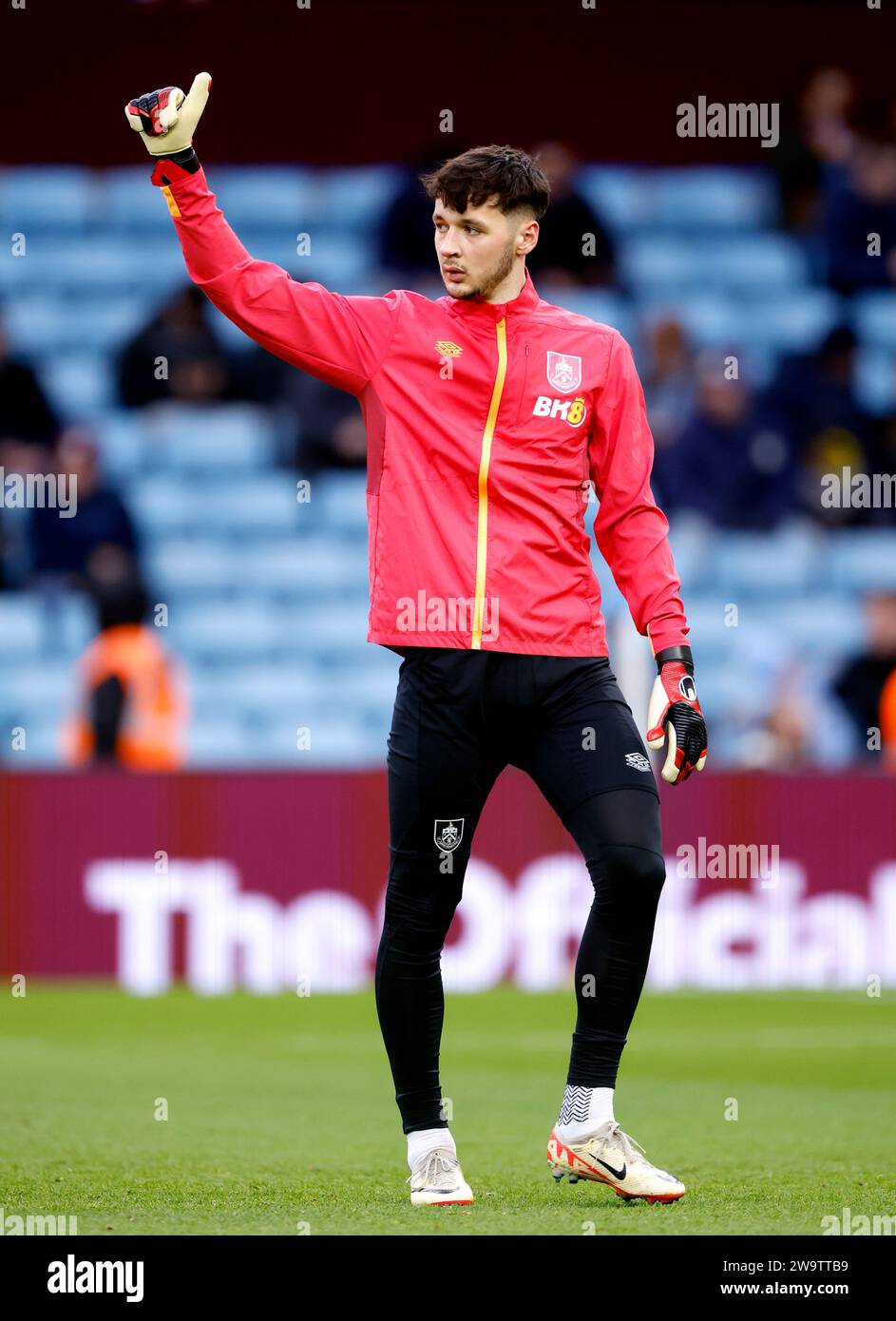 Burnley goalkeeper James Trafford warms up ahead of the Premier League ...