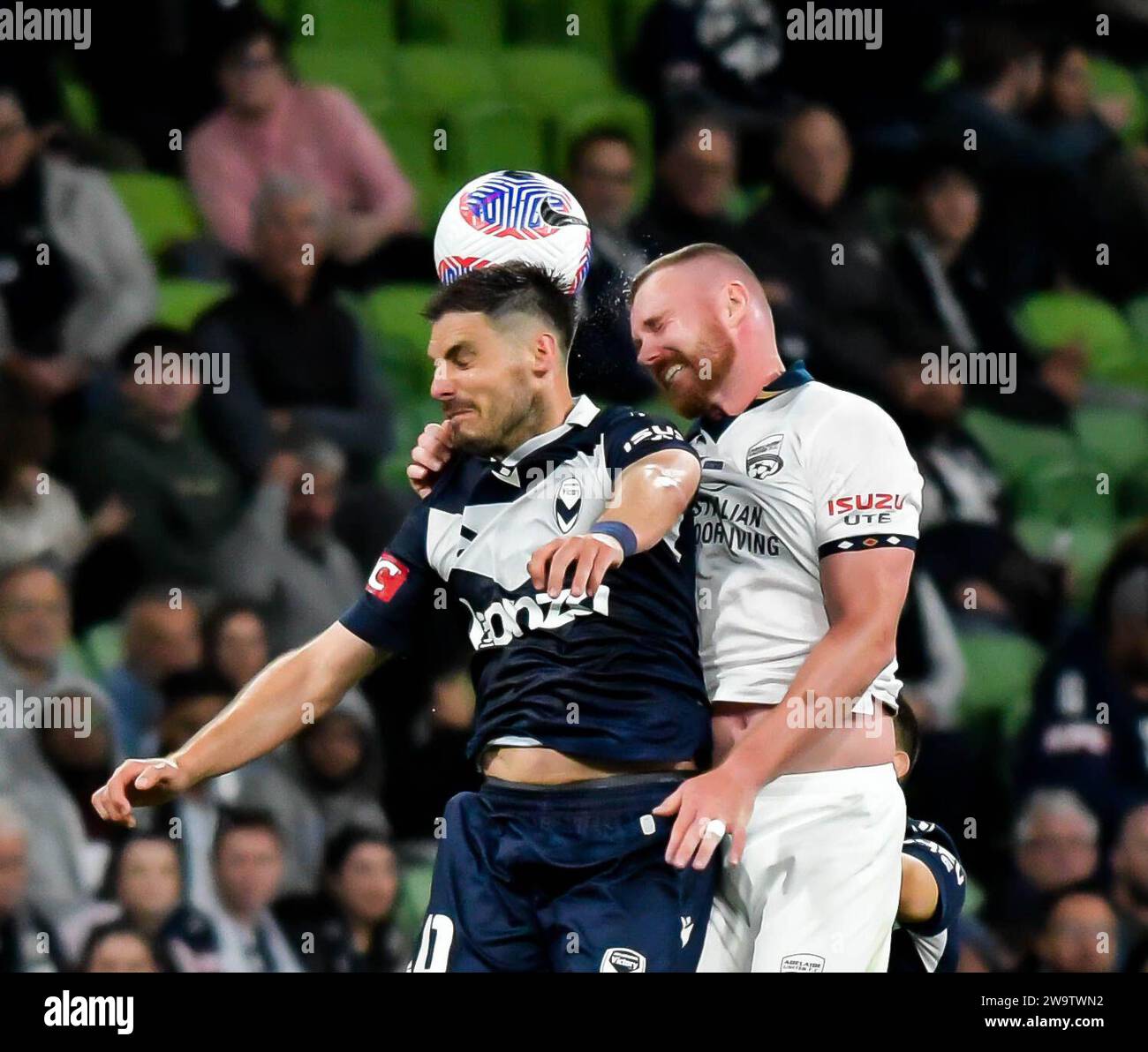 Bruno Fornaroli of Melbourne Victory challenges Adelaide's Ryan ...