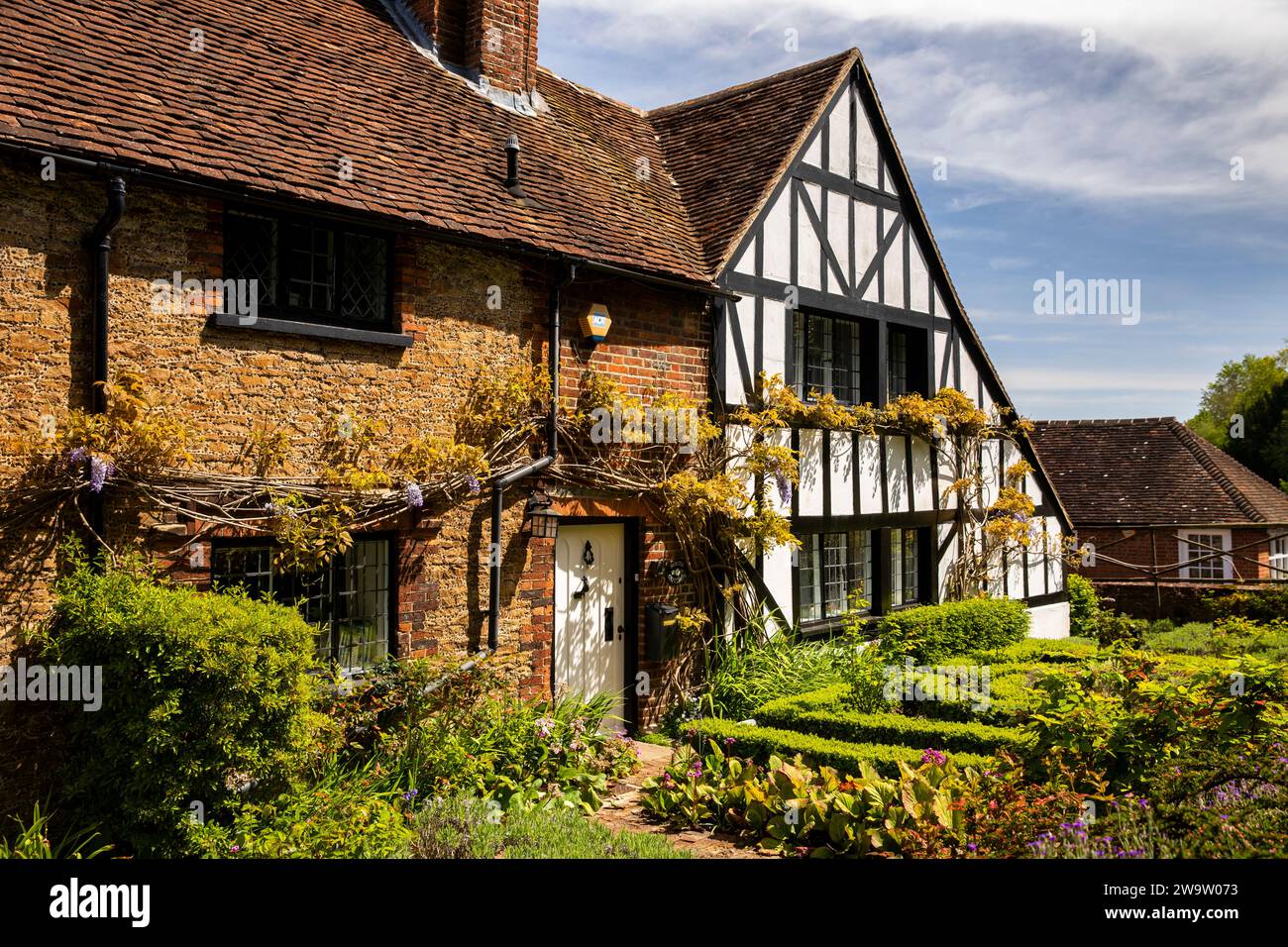 UK, England, Surrey, Compton, historic village property with stones, in ...