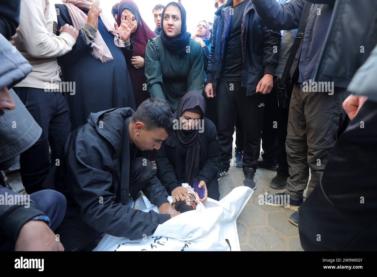 Relatives of the Palestinians died in Israeli attacks, mourn as they ...