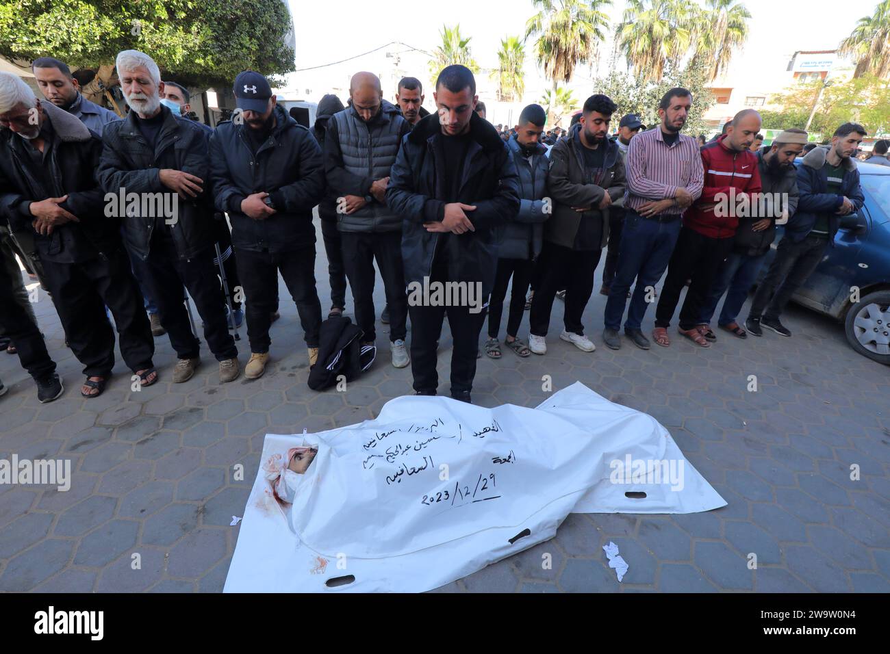 Relatives of the Palestinians died in Israeli attacks, mourn as they ...