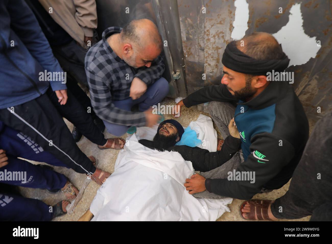 Relatives of the Palestinians died in Israeli attacks, mourn as they ...