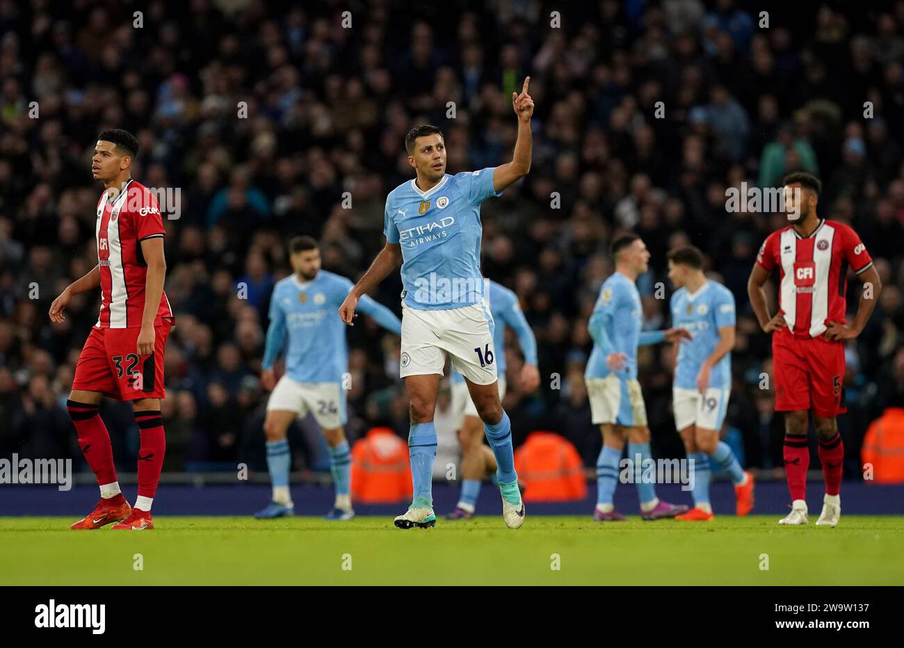 Manchester City's Rodri celebrates scoring their side's first goal of ...