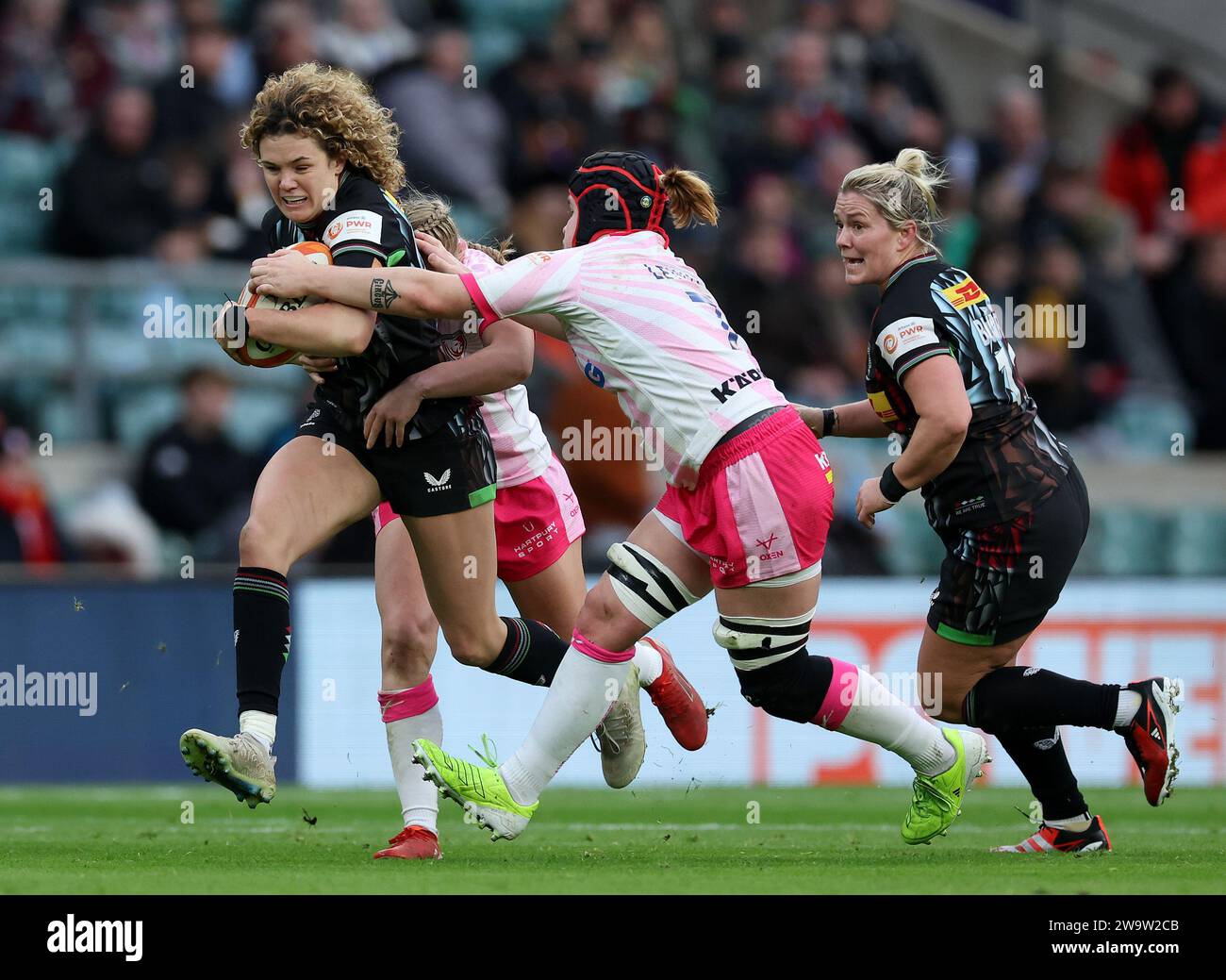 Harlequins' Ellie Kildunne is tackled during the Allianz Premiership ...