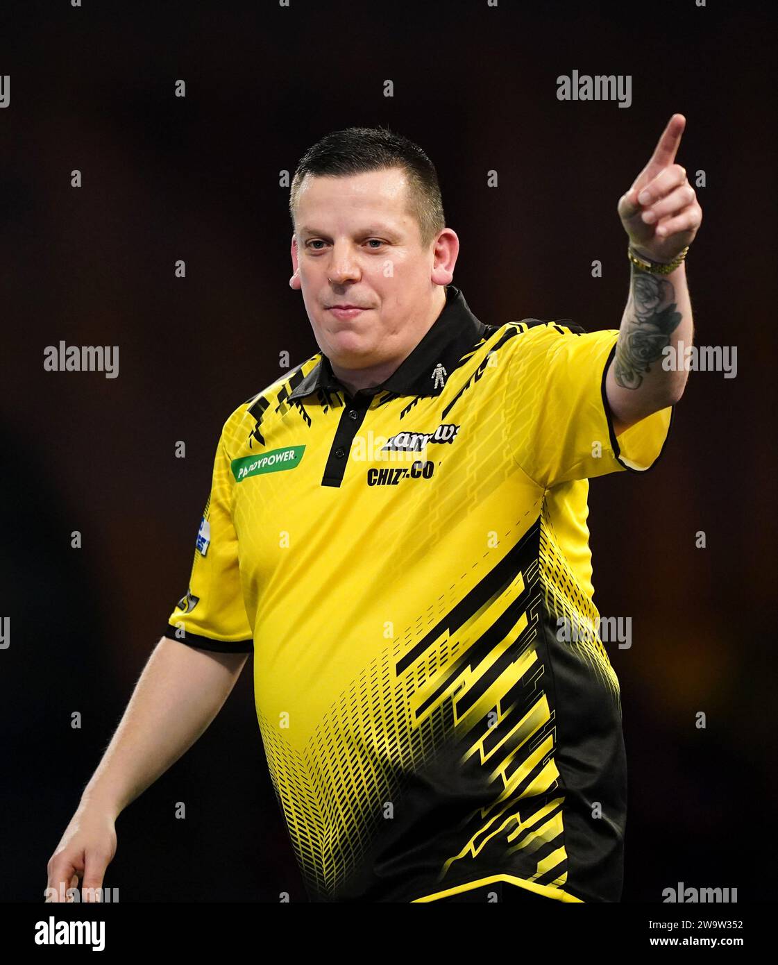 Dave Chisnall celebrates after beating Daryl Gurney (not pictured) on ...