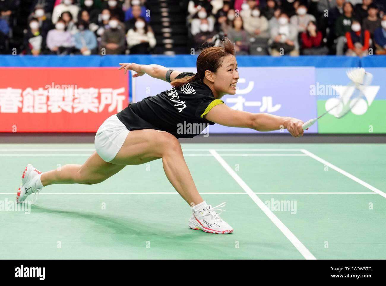 Nozomi Okuhara returns a shuttle during the women's singles final match ...