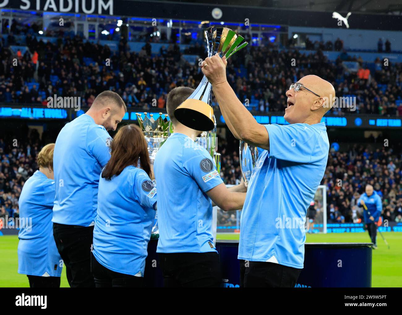 Manchester, UK. 30th Dec, 2023. Manchester City fan celebrates with the ...