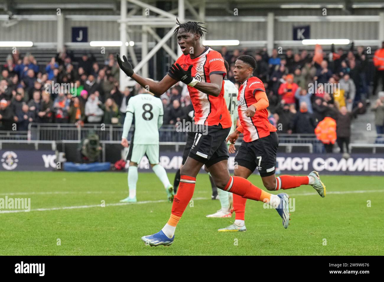 Luton, UK. 30th Dec, 2023. Elijah Adebayo (11) of Luton Town celebrates ...