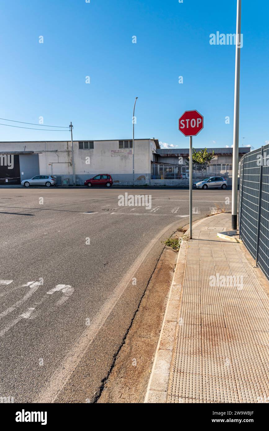 Vertical stop sign on a suburban street Stock Photo - Alamy