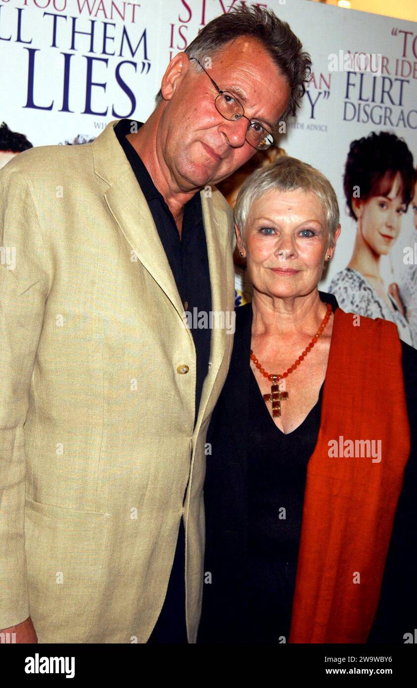 File Photo Dated 04 09 02 Of Tom Wilkinson And Judi Dench Arriving For