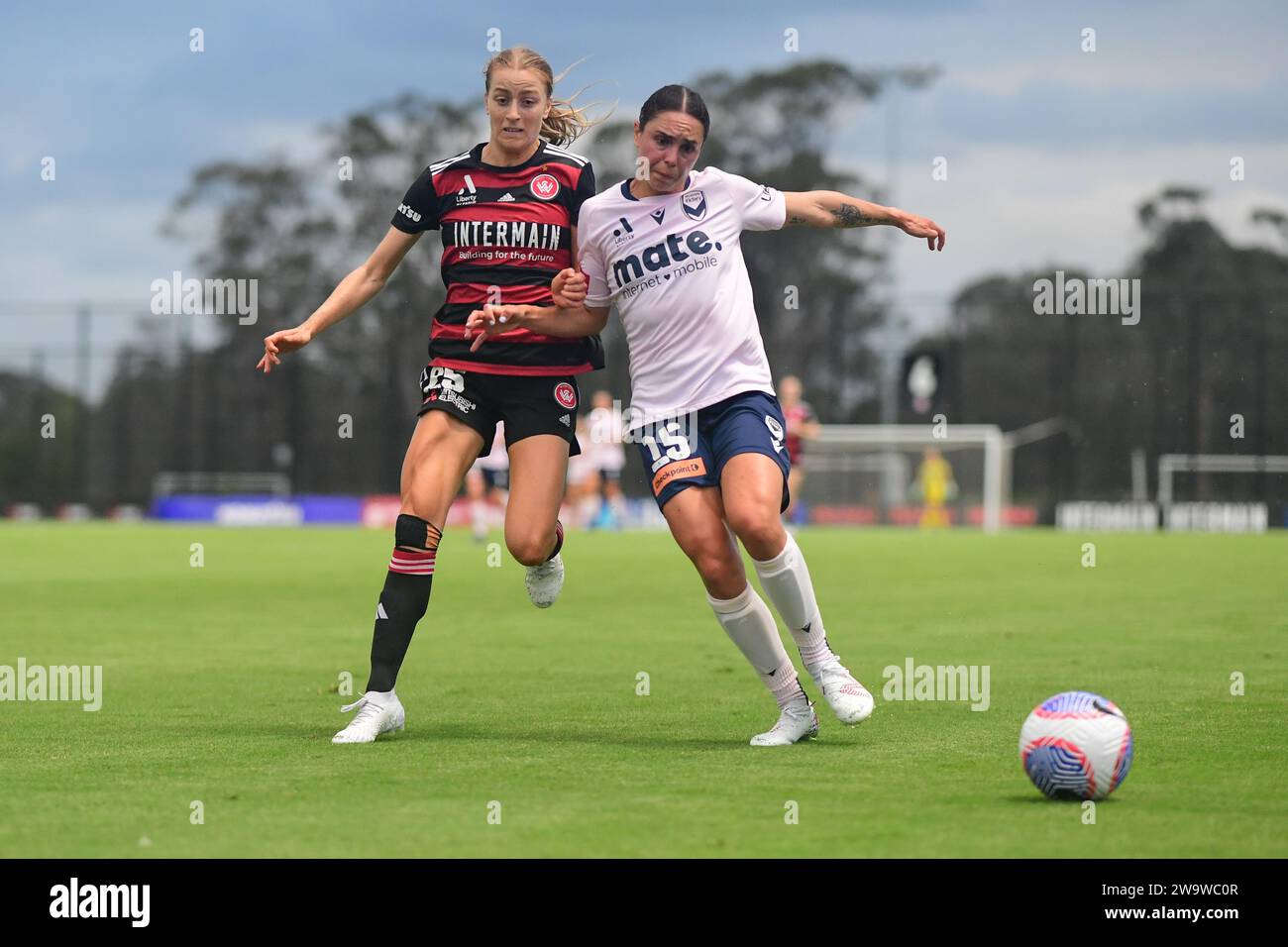 Rooty Hills, Australia. 30th Dec, 2023. Holly Caspers (L) of Western ...
