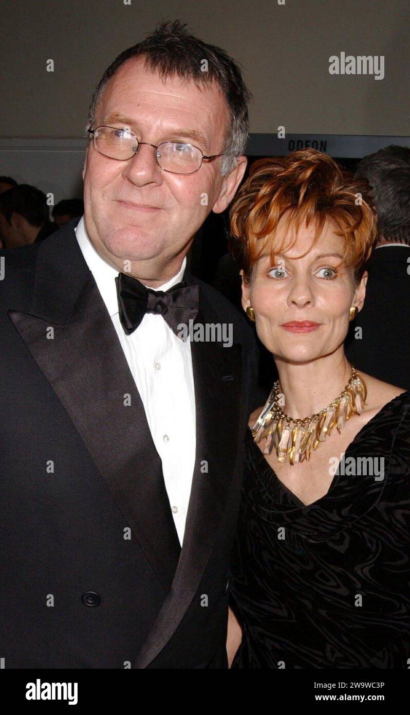 File photo dated 24/02/02 of Tom Wilkinson and his wife Diana arriving ...