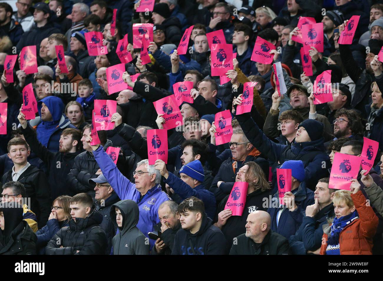 Wolverhampton, UK. 30th Dec, 2023. Everton fans hold up their ‘Corrupt ...