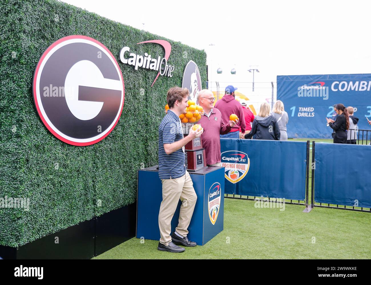 December 30, 2023:.FSU Fans pose with the Capital One Orange Bowl ...