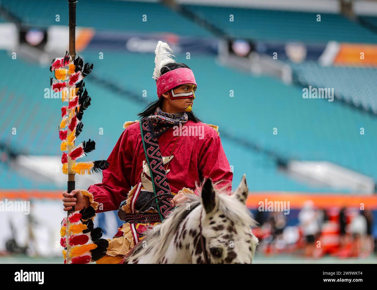 December 30, 2023:.Chief Osceola and Renegade walk the field before the ...