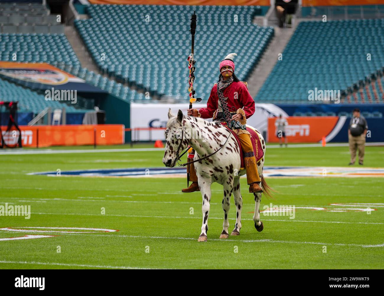 December 30, 2023:.Chief Osceola and Renegade walk the field before the ...