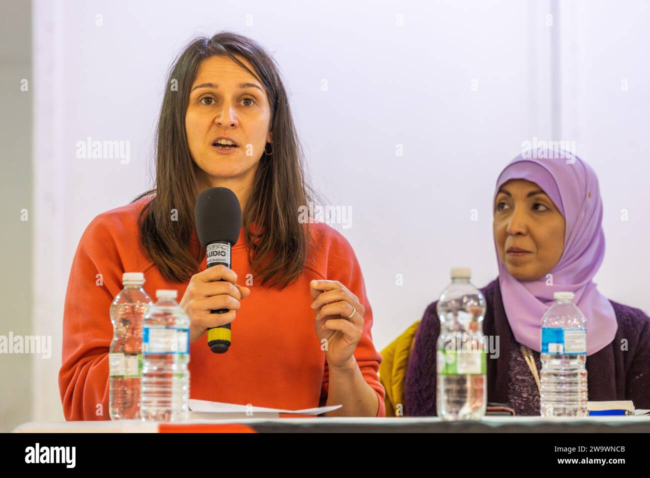 city, UK. DD MMM, 2023. Pictured left to right, (persons) at (event ...