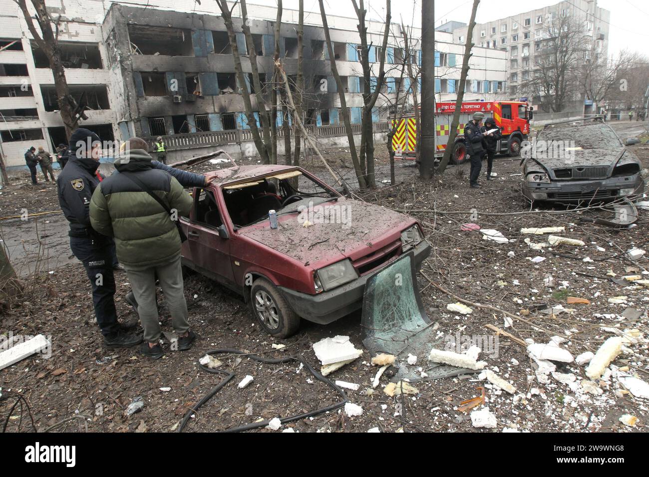 Non Exclusive: DNIPRO, UKRAINE - DECEMBER 29, 2023 - Men stand next to ...
